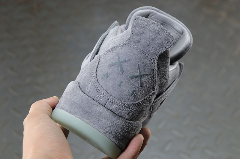 KAWS x Air Jordan 4 Retro 'Cool Grey' - SneakerCool.com