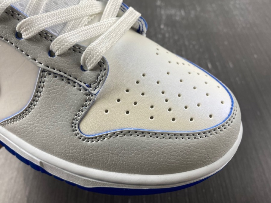 Dunk Low 'Worldwide Pack - White Game Royal' - SneakerCool.com