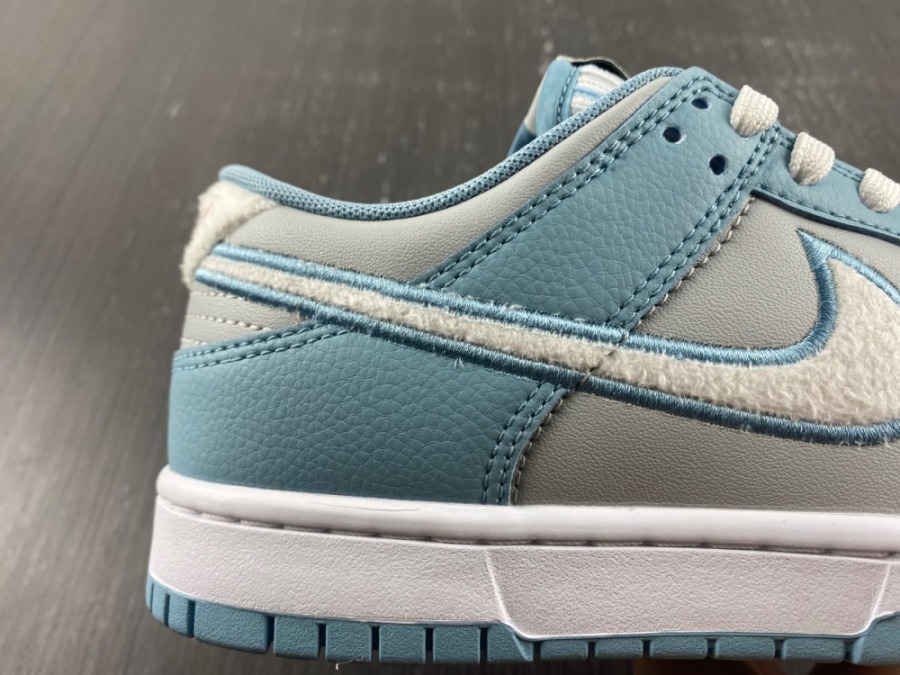 Dunk Low 'Fleece Swoosh - Light Blue' - SneakerCool.com