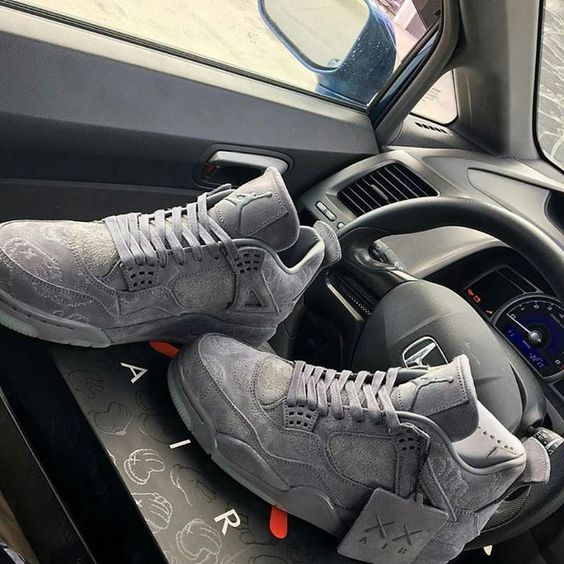 KAWS x Air Jordan 4 Retro 'Cool Grey' - SneakerCool.com