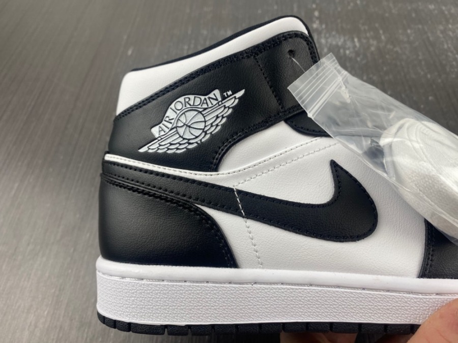 Air Jordan 1 Mid 'Panda' - SneakerCool.com