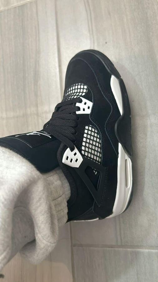 Air Jordan 4 Retro 'White Thunder' - SneakerCool.com